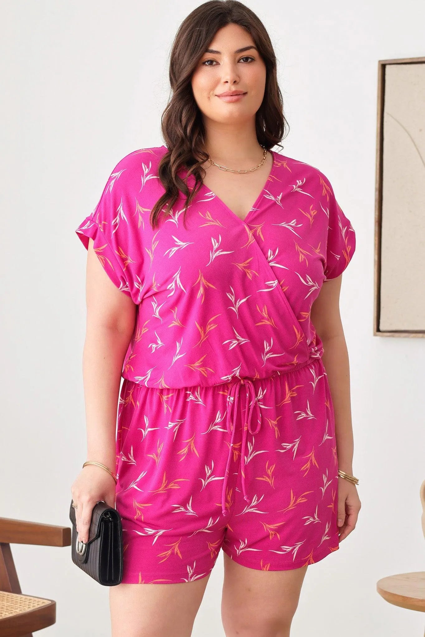 Wholesale Plus Size Floral Warp Bust Adjustable Waist Belt Rompers